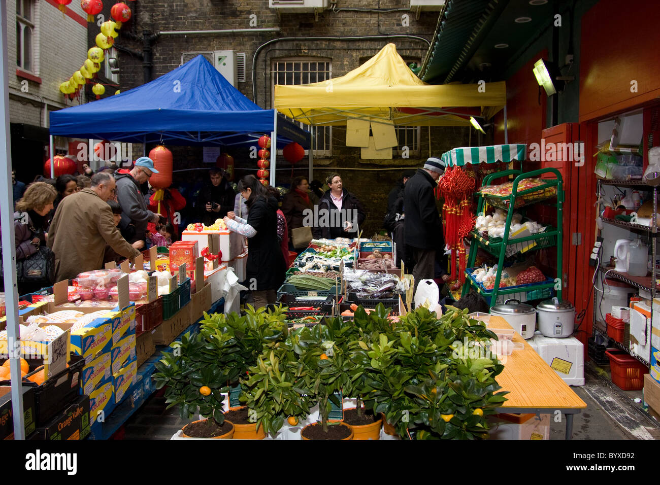 Chinese outside food store stall Stock Photo - Alamy