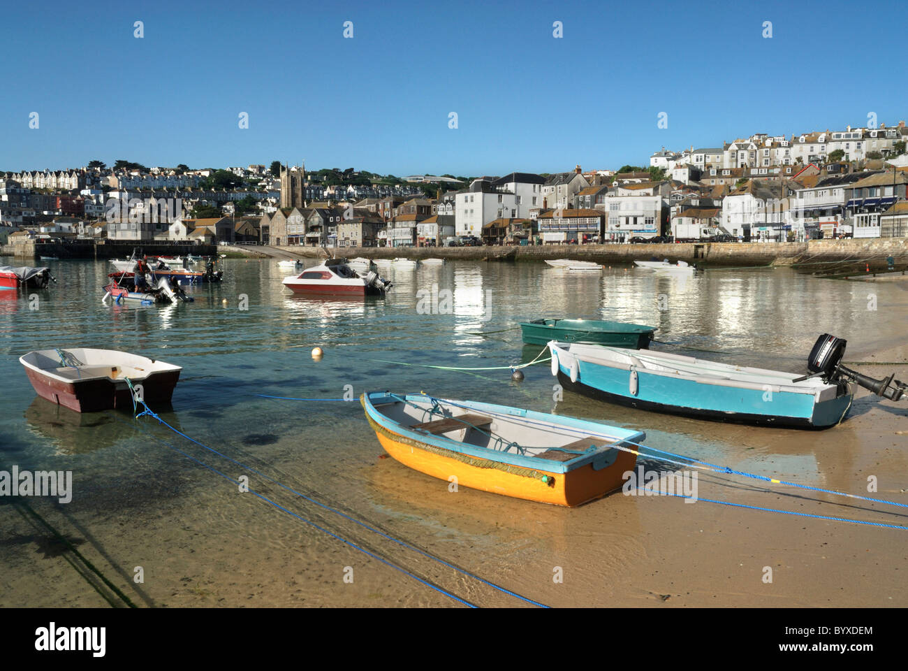 small recreational boats and fishing boats in the harbour at st Ives in ...