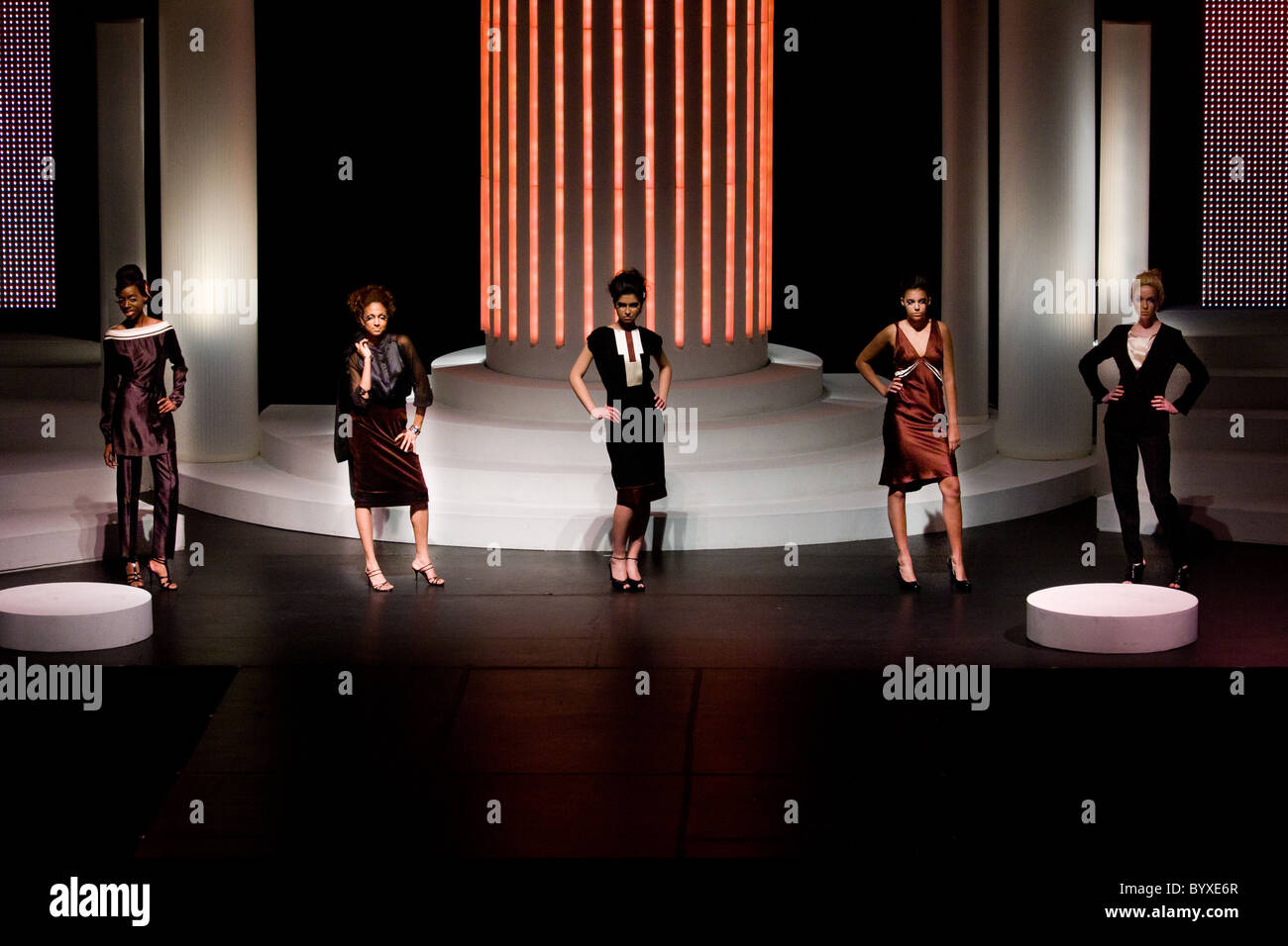 five female models standing runway school show Stock Photo - Alamy