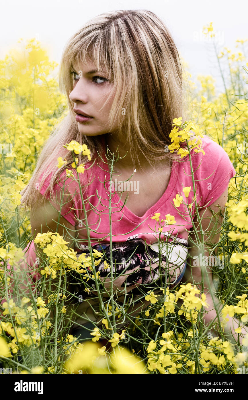 girl with color in low saturation looking around a little bit scared ...