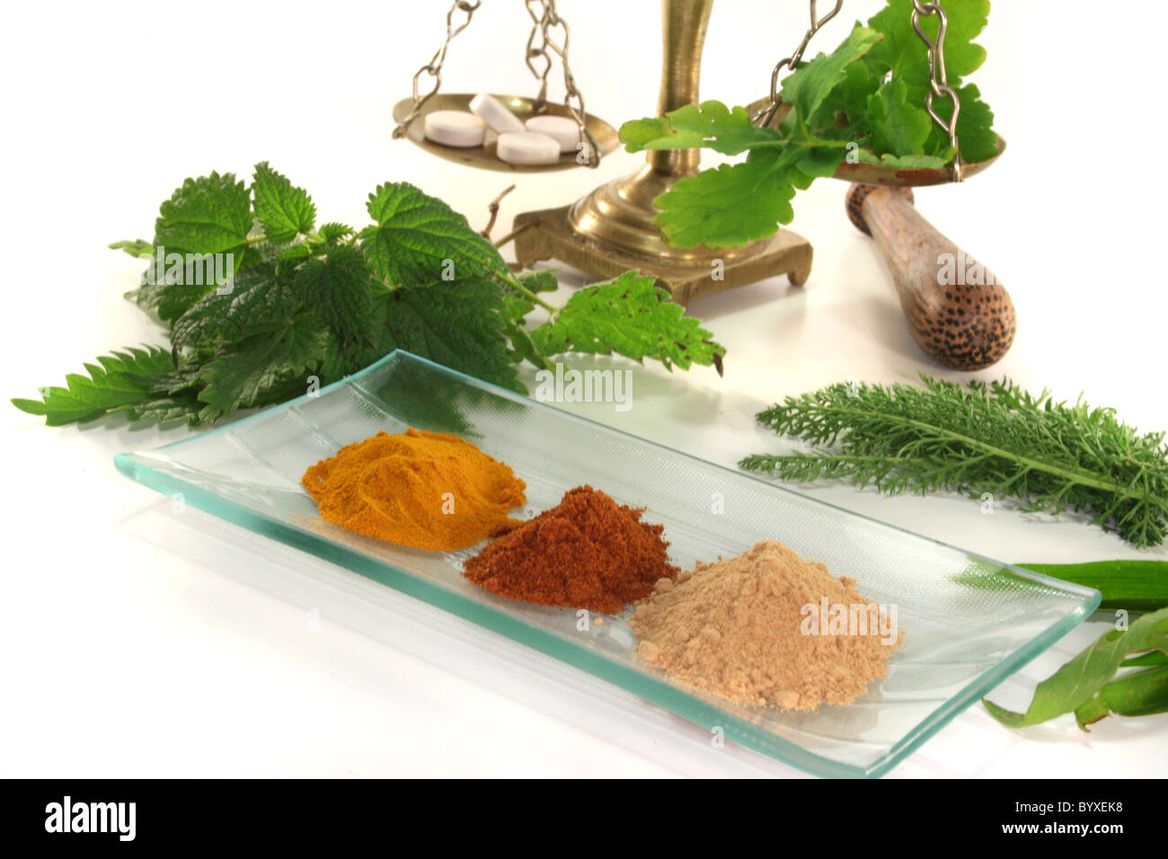 Pharmacists scale with mortar, tablets and fresh herbs Stock Photo - Alamy