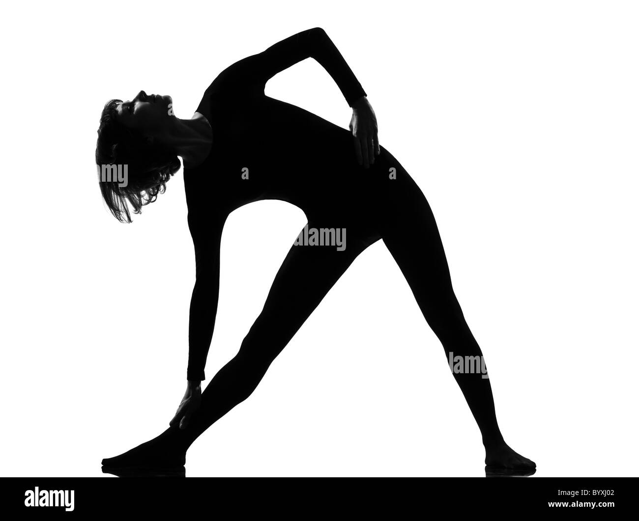 Trikonasana or triangle pose Black and White Stock Photos & Images - Alamy