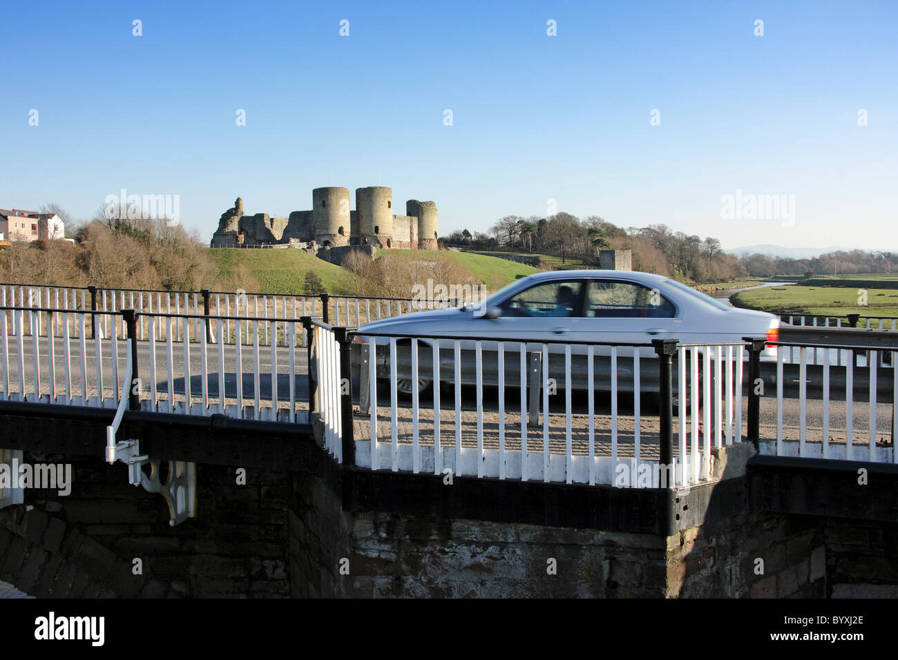 A view of Rhuddlan castle, North Wales with the road bridge in the ...
