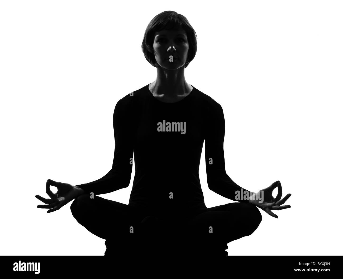 woman lotus pose yoga Padmasana posture position in silouhette on ...