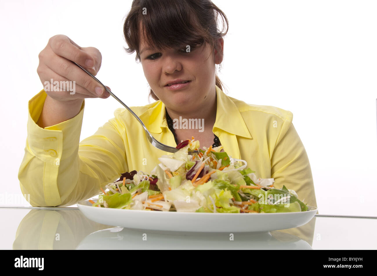 Girl eats Salad Stock Photo - Alamy