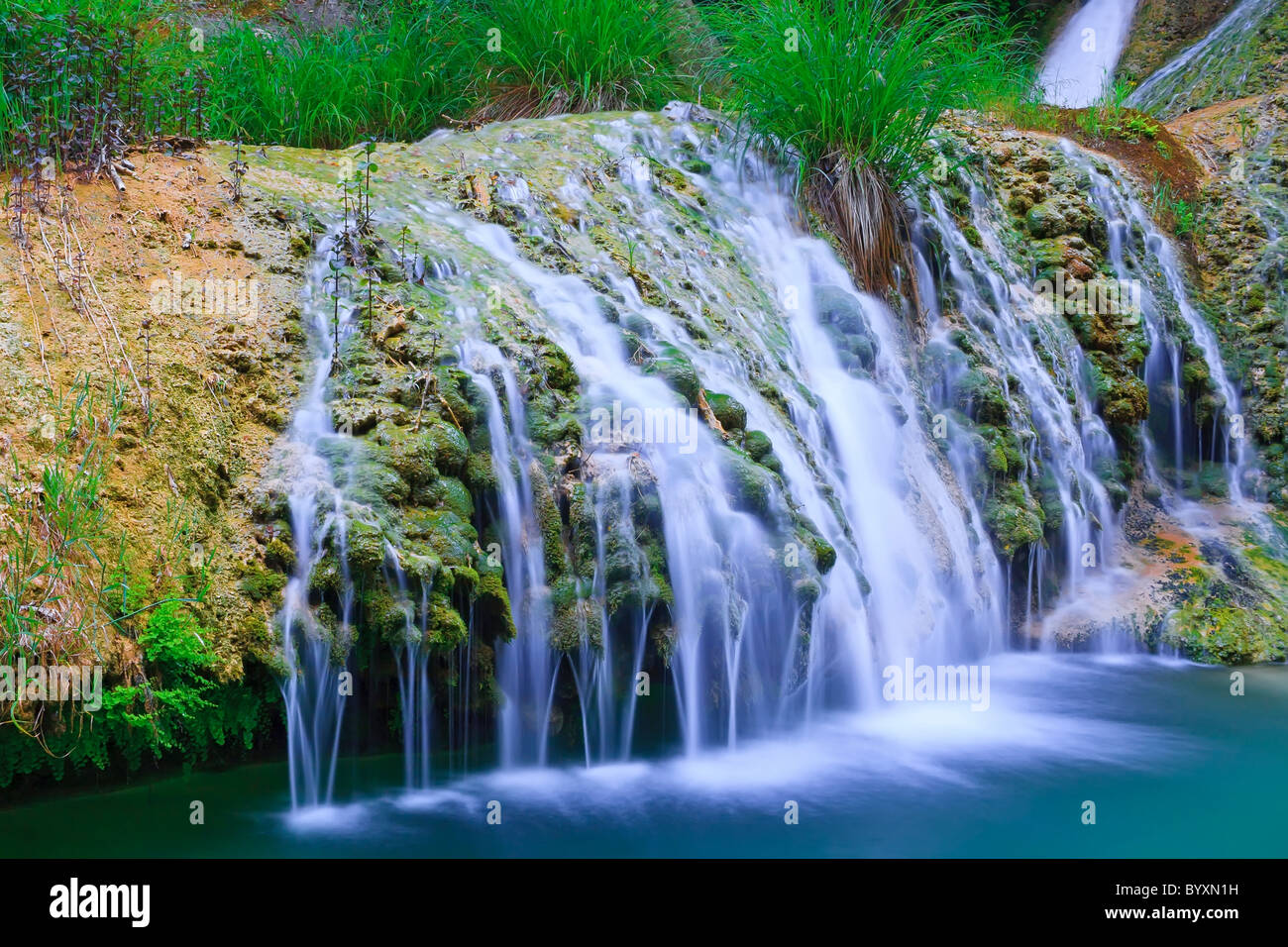 Natural waterfall and lake in Polilimnio area in Greece Stock Photo - Alamy
