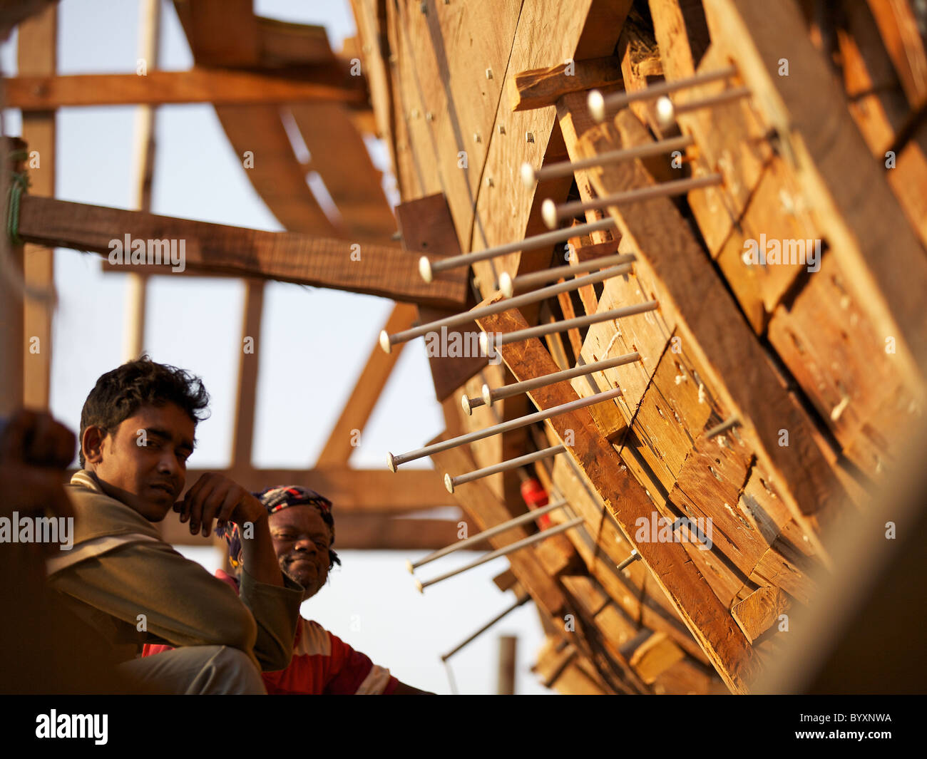An enormous new traditional wooden dhow under construction, Jaddaf ...