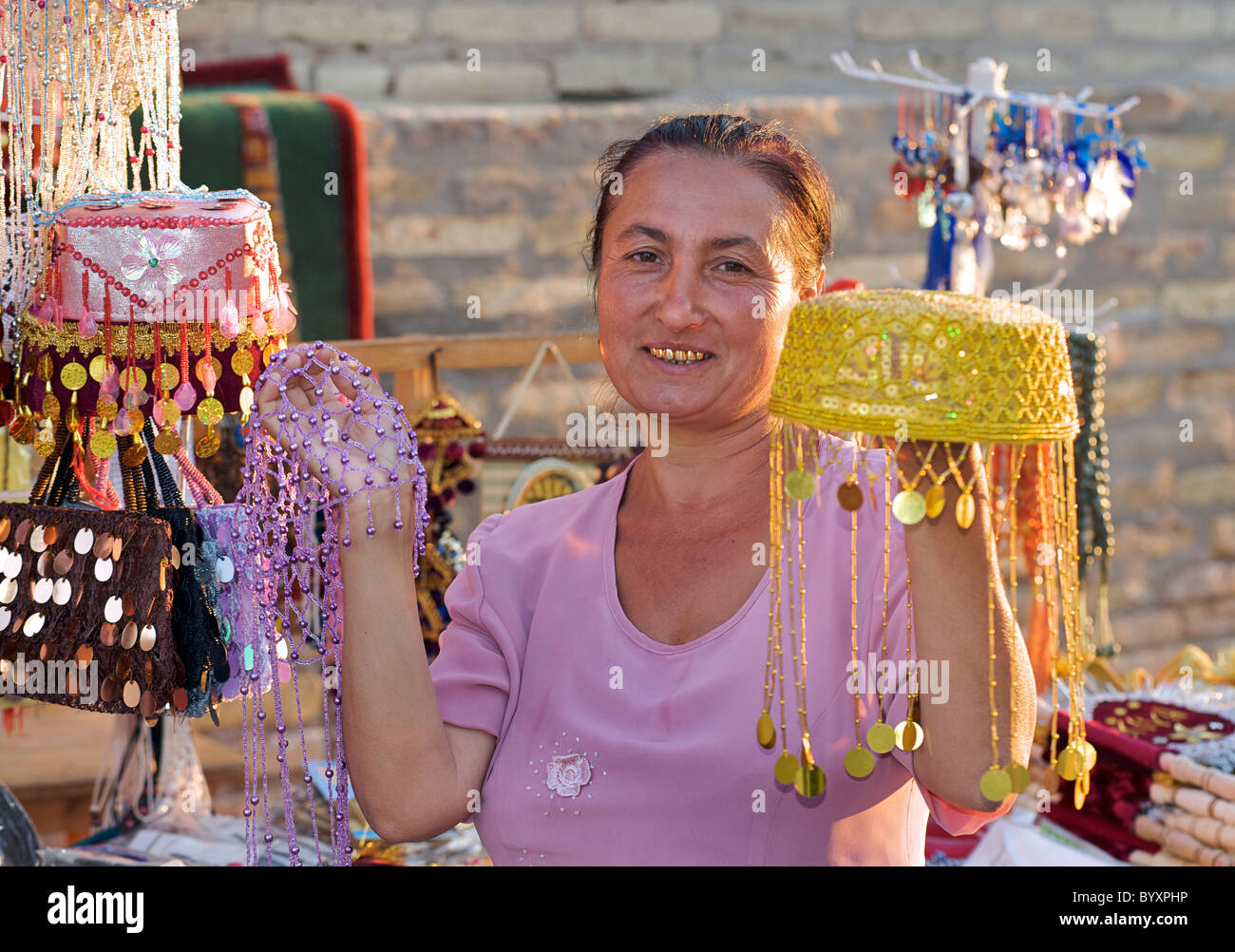Uzbeki traditional hat vendor, Khiva, Uzbekistan Stock Photo - Alamy
