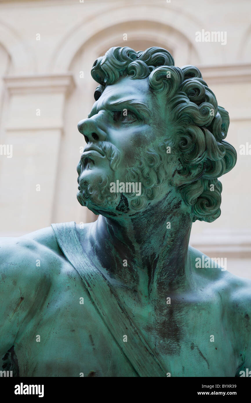 bust of bronze man statue; paris, france Stock Photo - Alamy