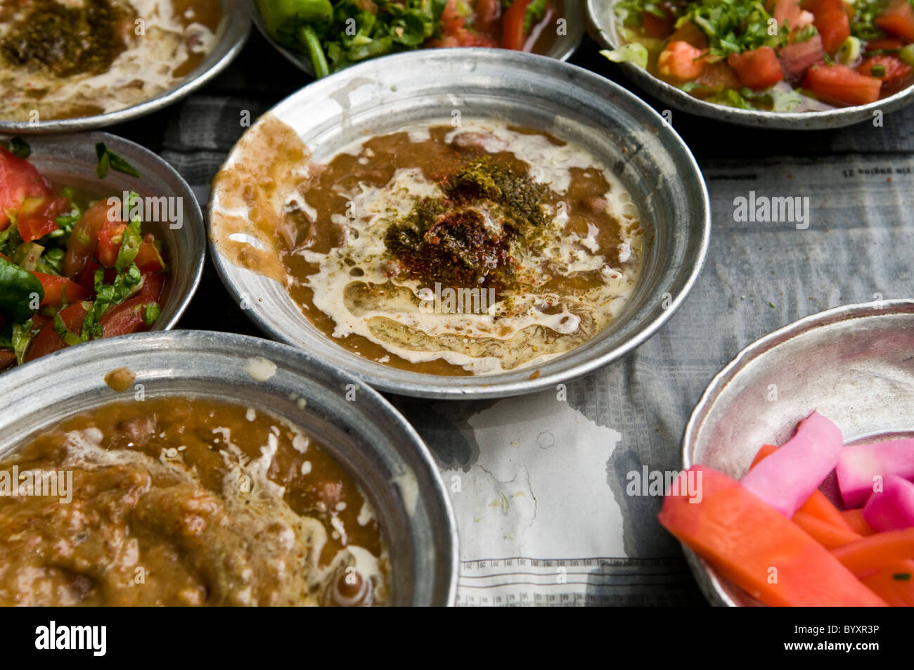 Egyptian breakfast. Fuul - Fava beans paste with veggies and Pita bread ...