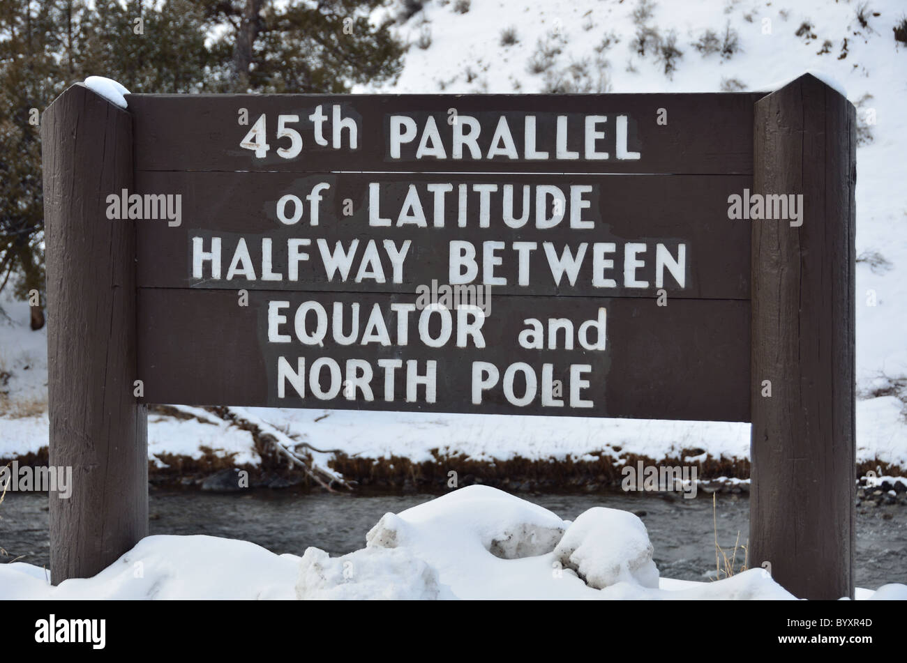 A sign marked the 45th parallel. Yellowstone National Park, Montana ...
