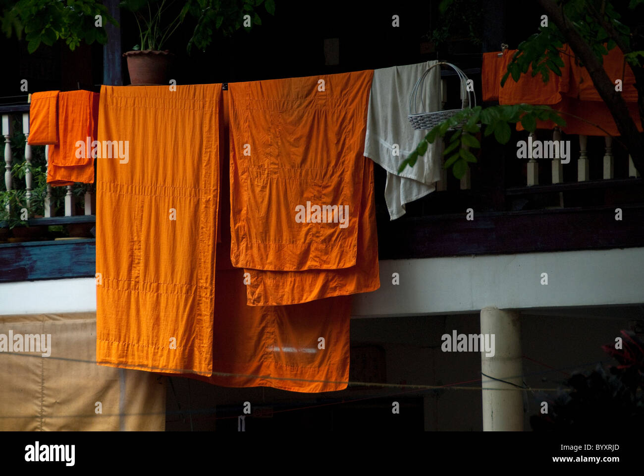 Monk washing clothes hi-res stock photography and images - Alamy