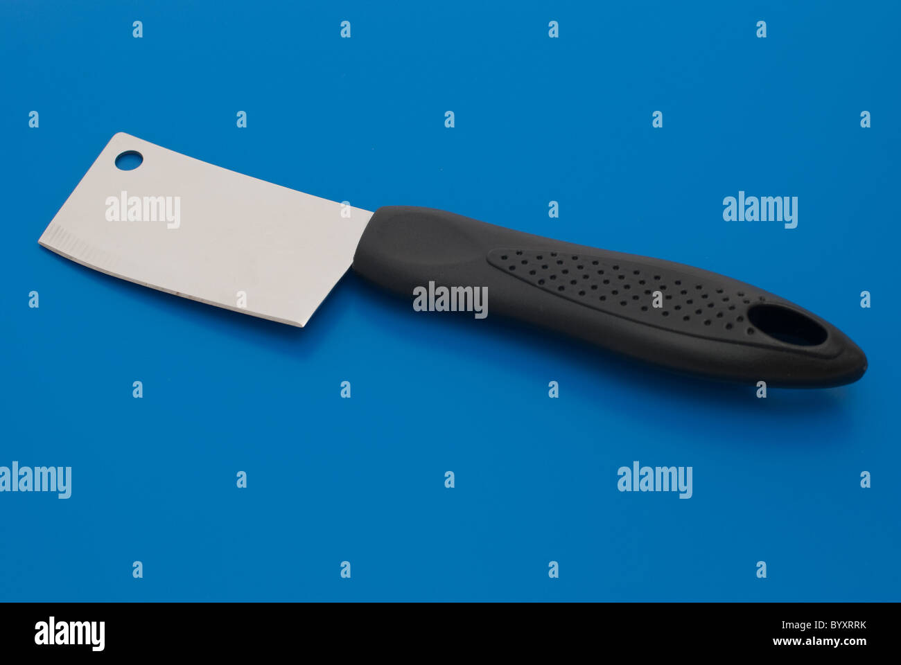 Smal cleaver isolated on the blue background Stock Photo - Alamy