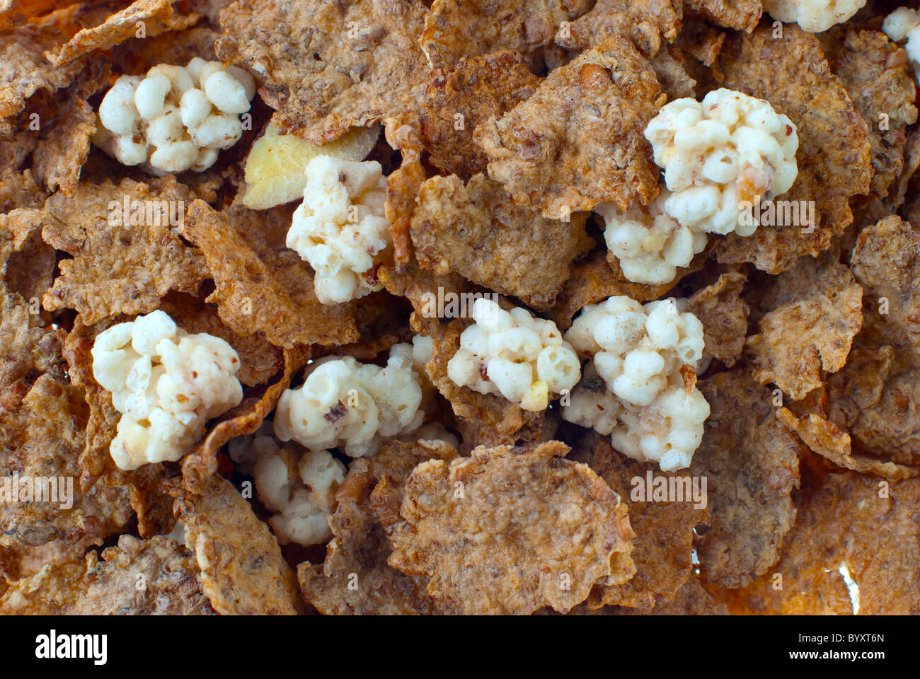 Crunchy breakfast cereals background with all sorts of nuts, food ...