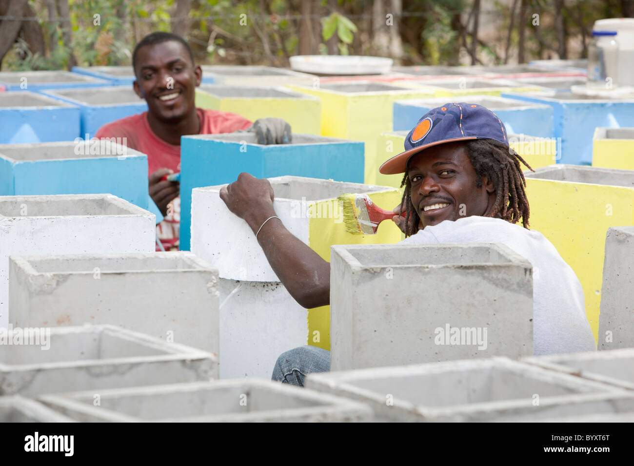 men making biosand water filters by the charity clean water for haiti ...