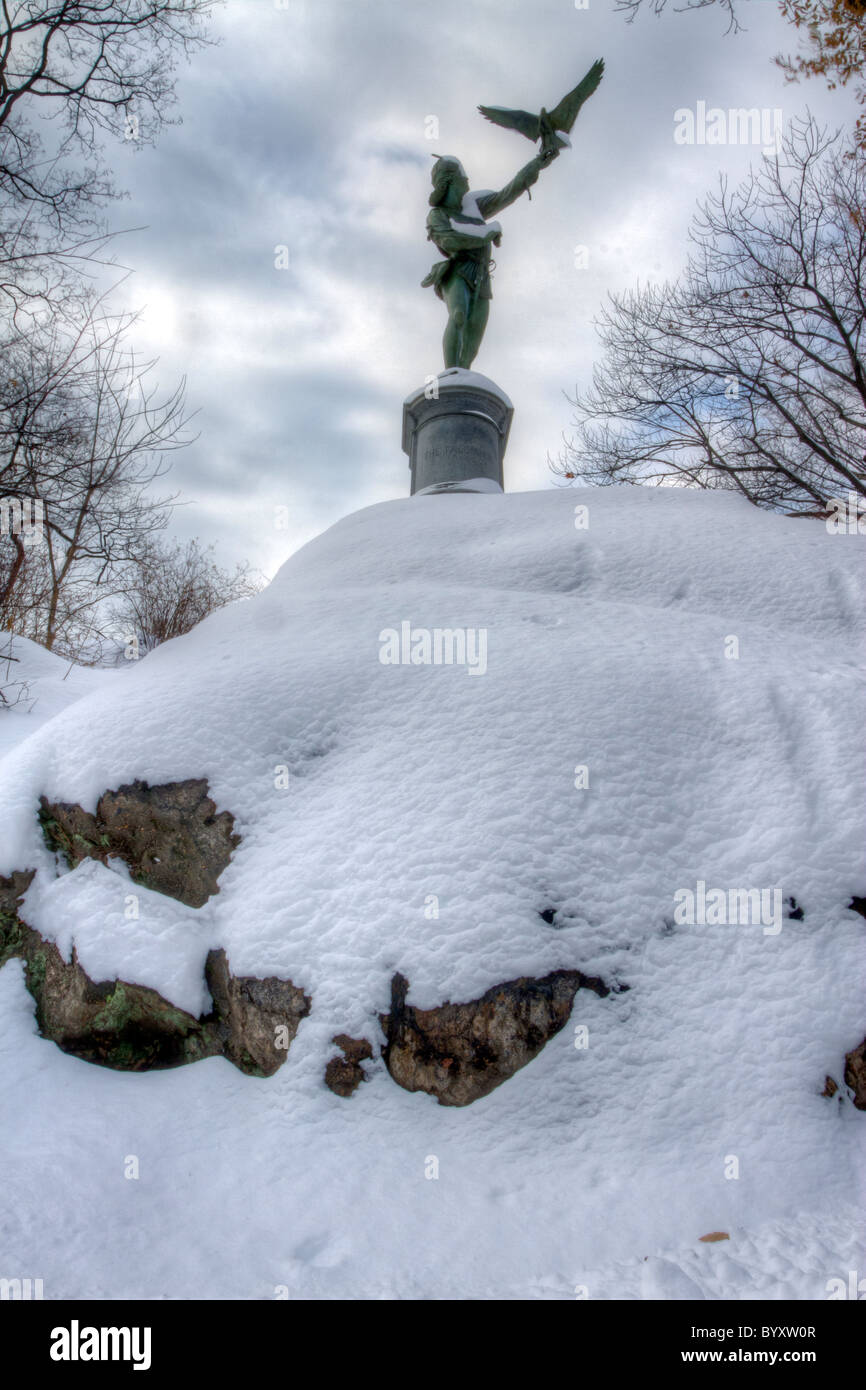 Snow-covered Statue of the Falconeer in Central Park Stock Photo - Alamy