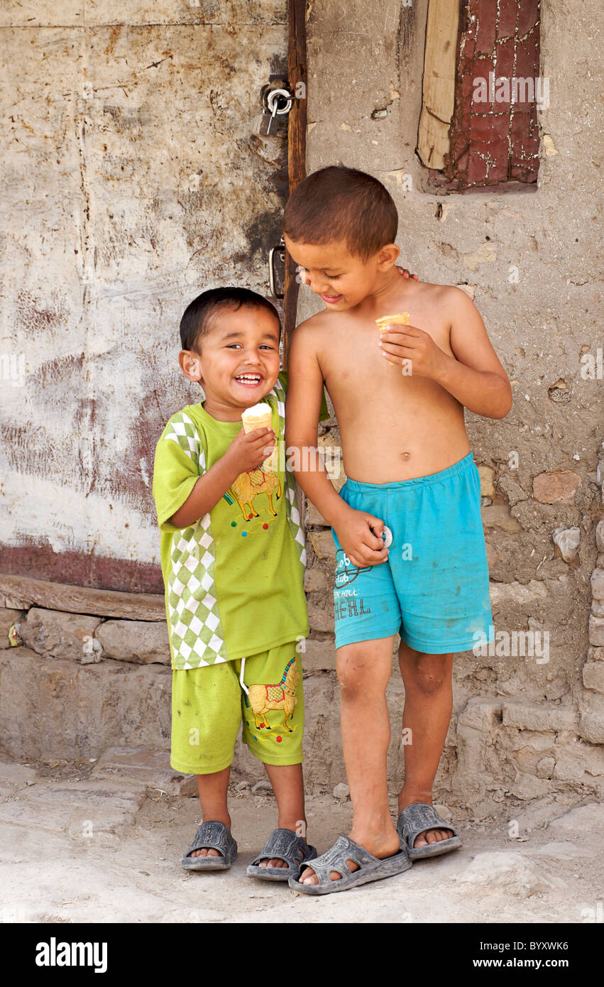 Portrait of young Uzbeki brothers or friends, Khiva, Uzbekistan Stock ...