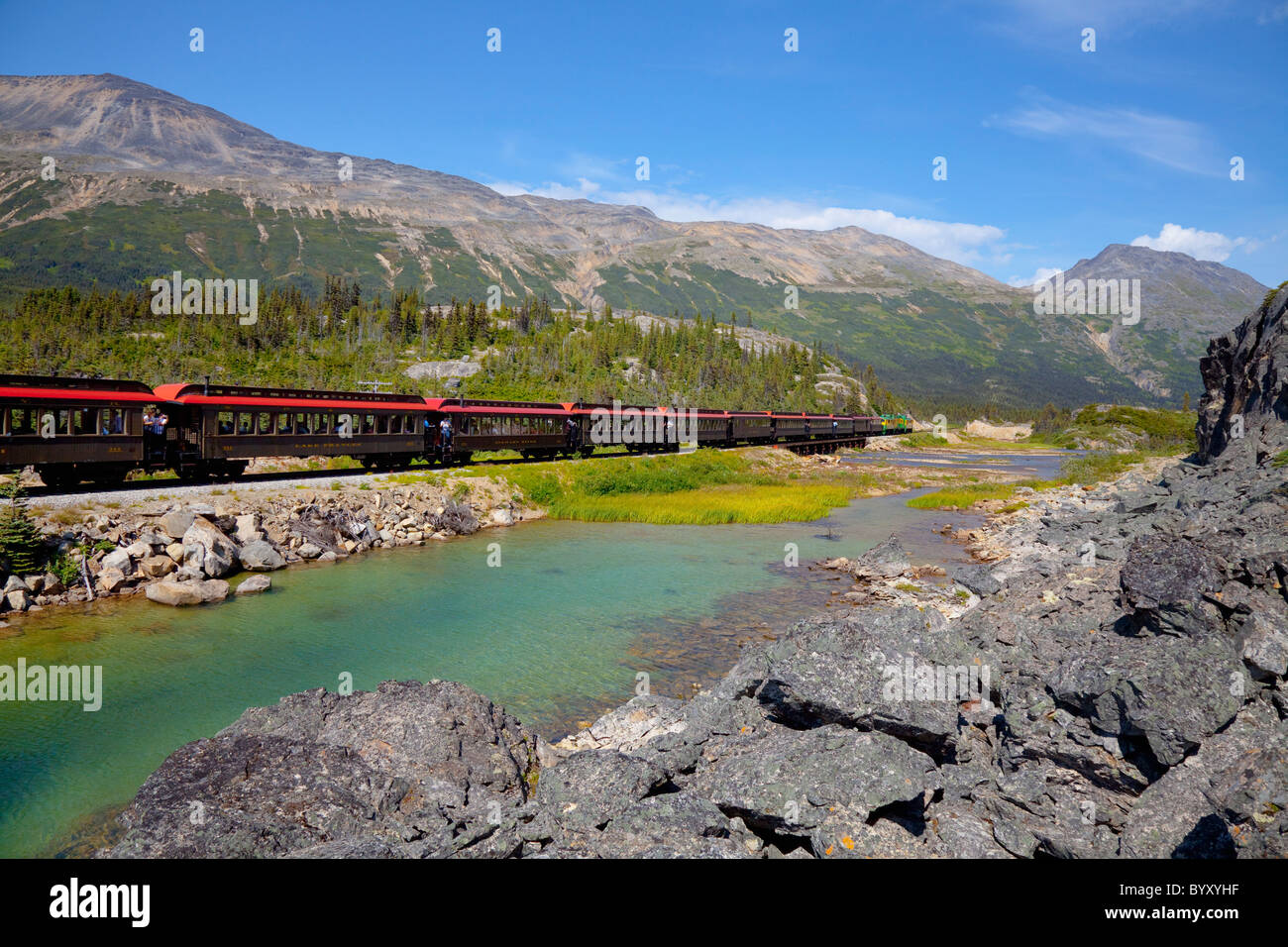 historic train travels through white pass trail; skagway, alaska ...