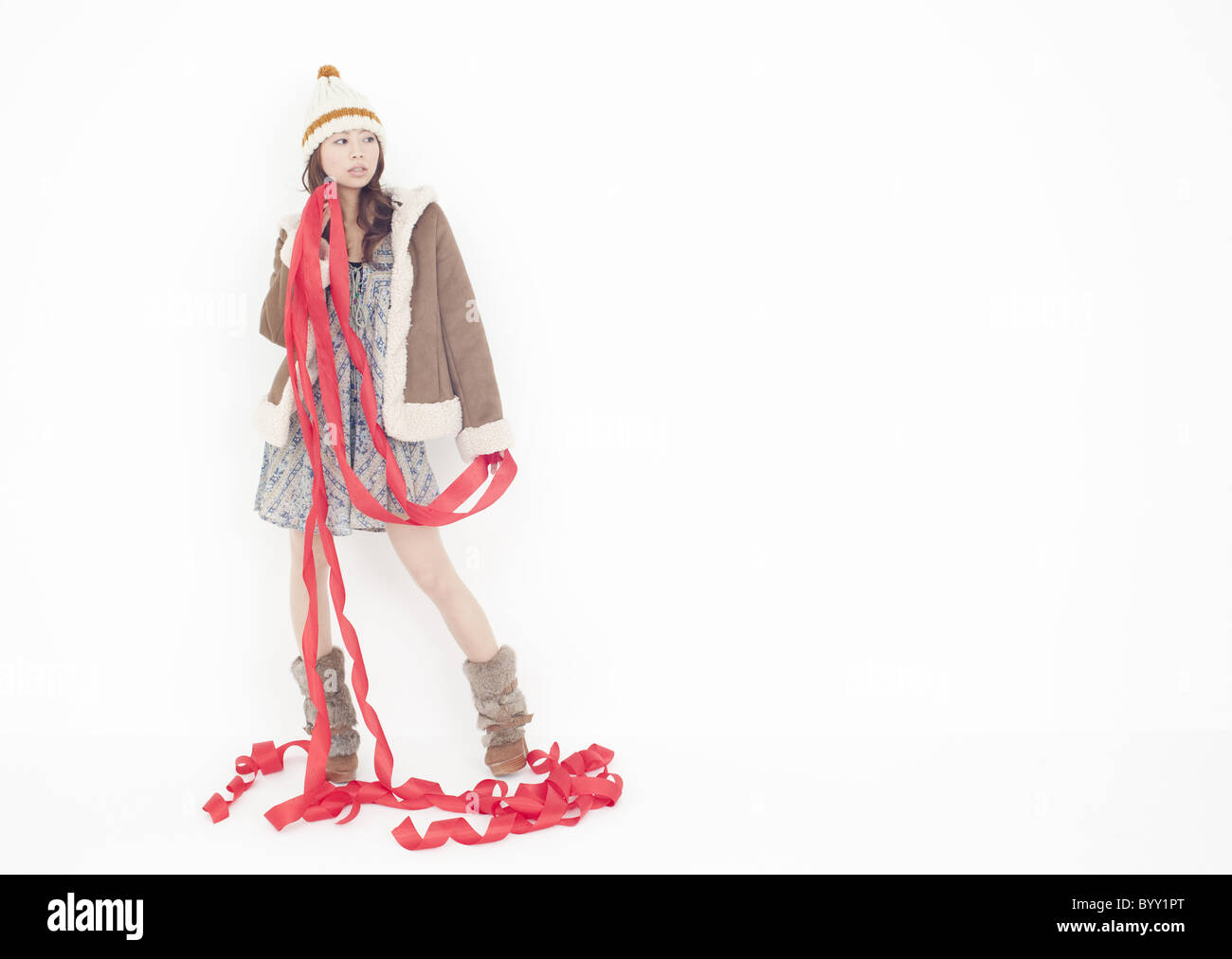 Woman holding back hair Cut Out Stock Images & Pictures - Alamy