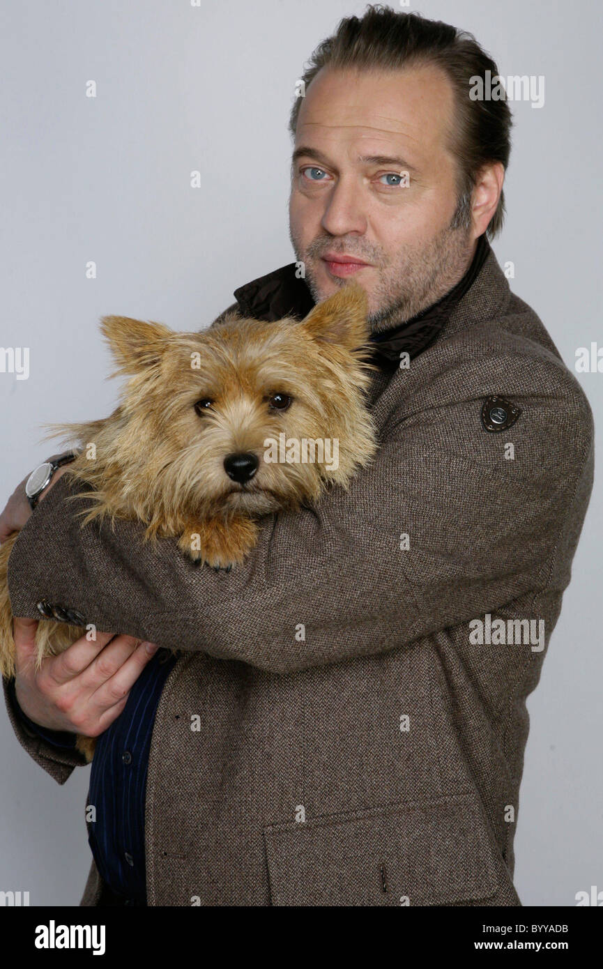 Jan Gregor Kremp holding Elvis, the dog Photocall for German TV series ...