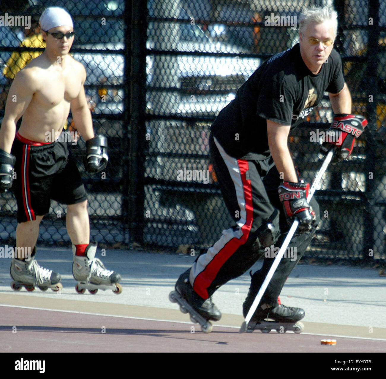 Oscar winner Tim Robbins in black 'Pogues' Tshirt, plays field hockey ...
