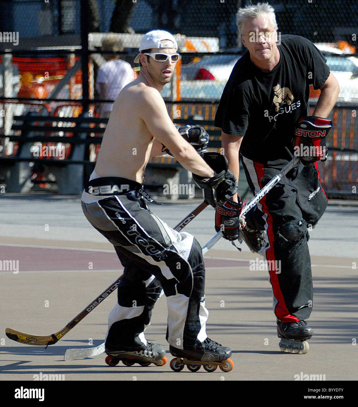 Oscar winner Tim Robbins in black 'Pogues' Tshirt, plays field hockey ...