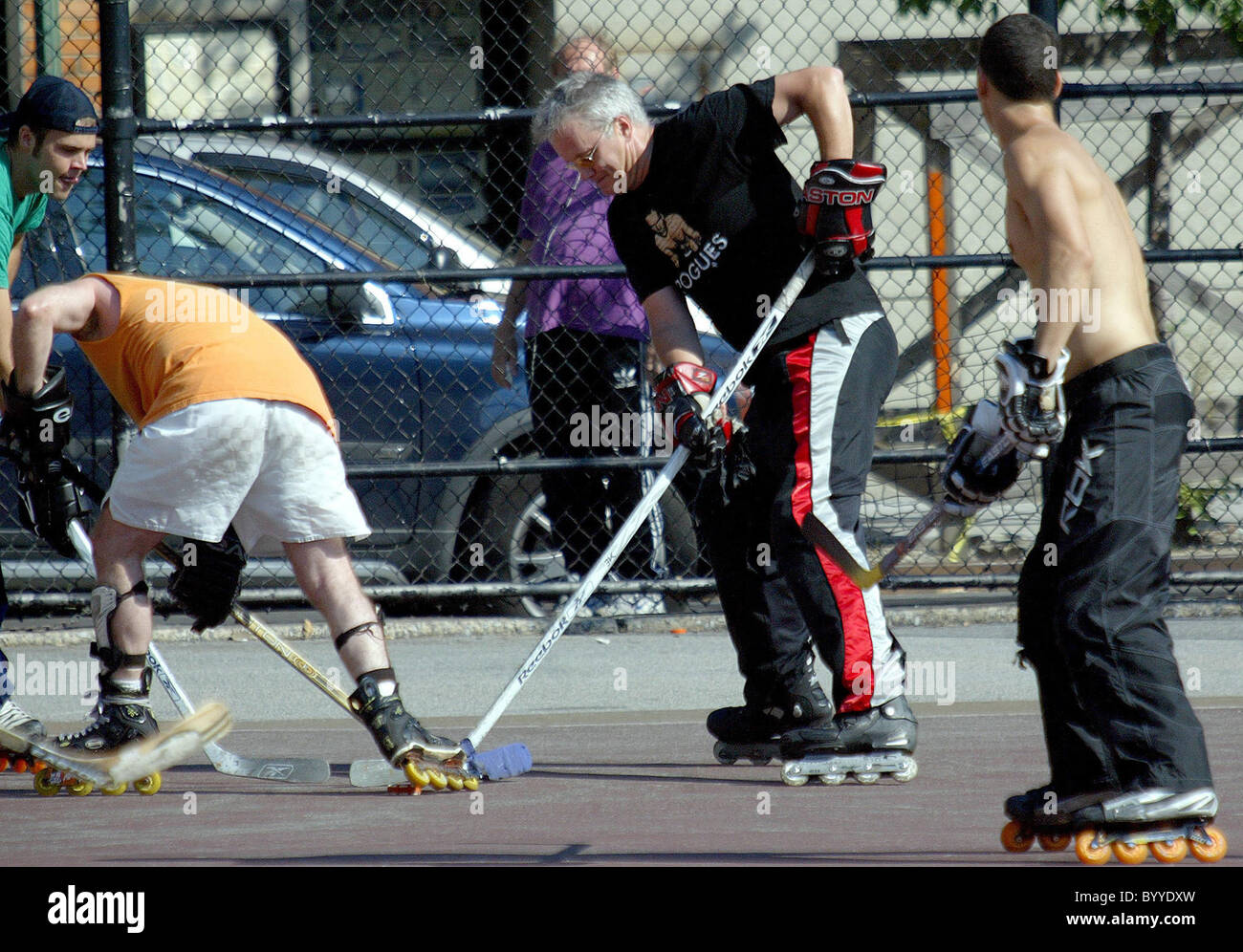 Oscar winner Tim Robbins in black 'Pogues' Tshirt, plays field hockey ...