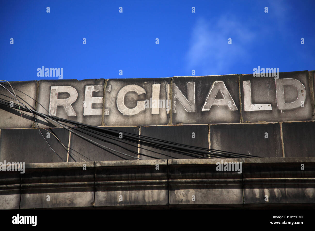 1930's architecture displaying the word Reginald Stock Photo - Alamy