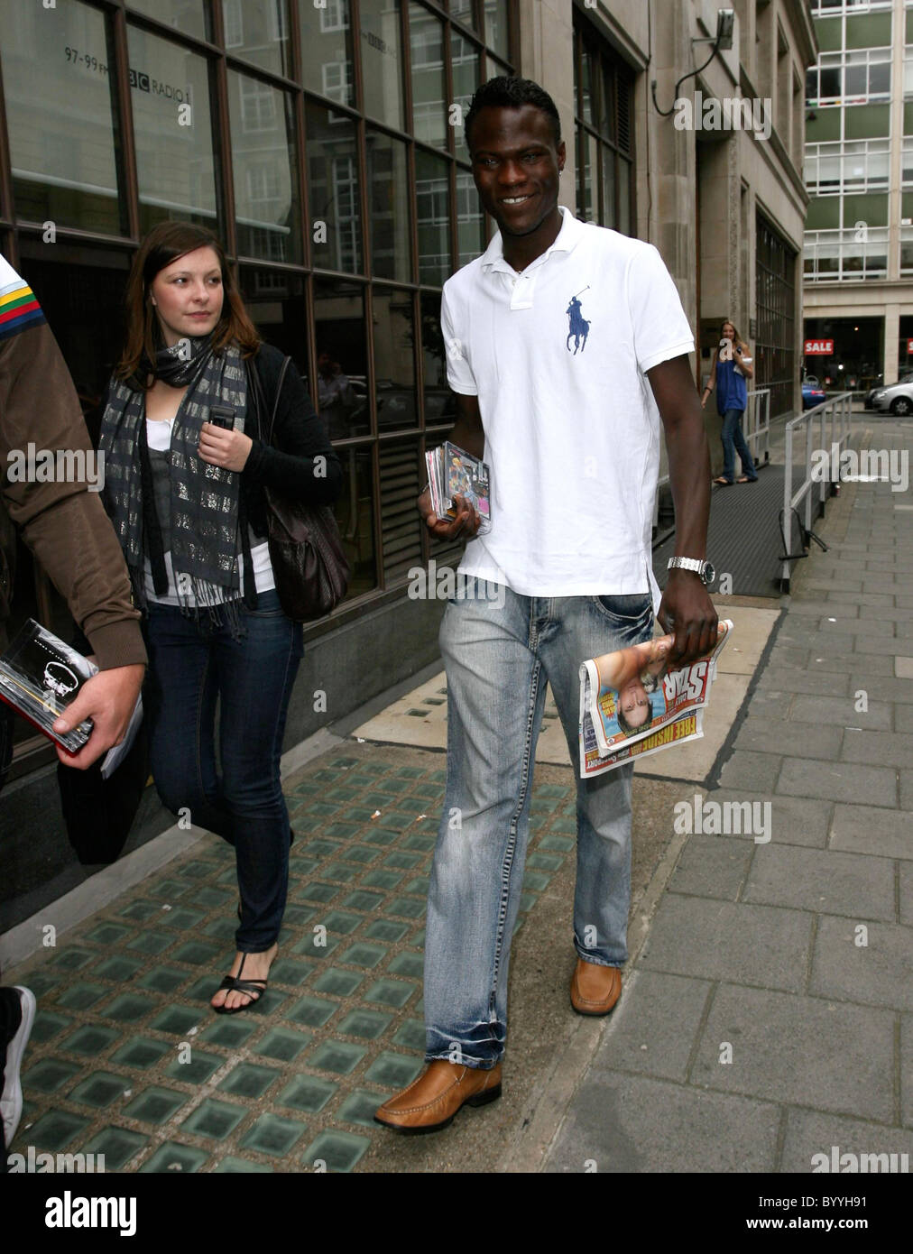 Big Brother 8 winner Brian Belo leaving the BBC Radio 1 Studios with a ...