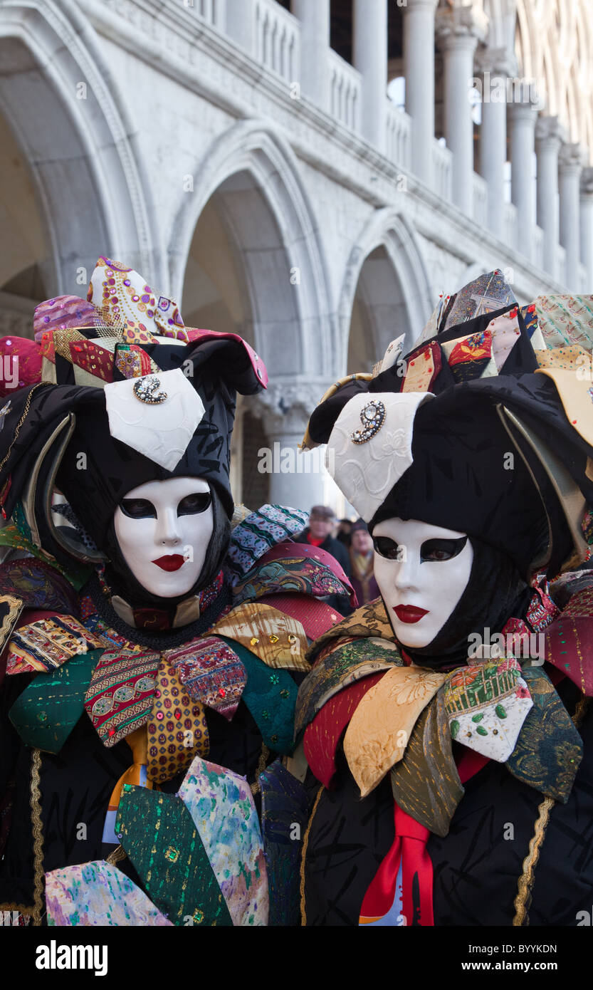 Italy, Venice, typical carnival masks in Piazza San Marco Stock Photo ...