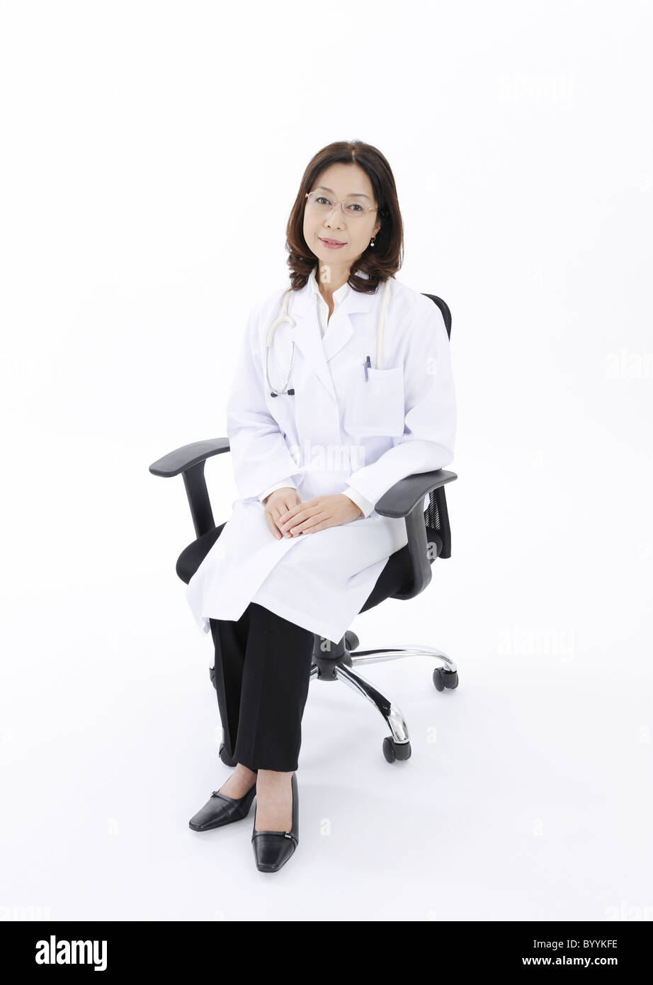 Female doctor sitting on chair Stock Photo - Alamy Female doctor sitting on chair Stock Photo - Alamy