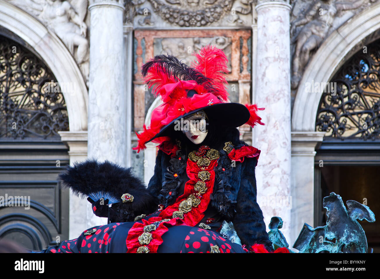 Italy, Venice, typical carnival masks in Piazza San Marco Stock Photo ...