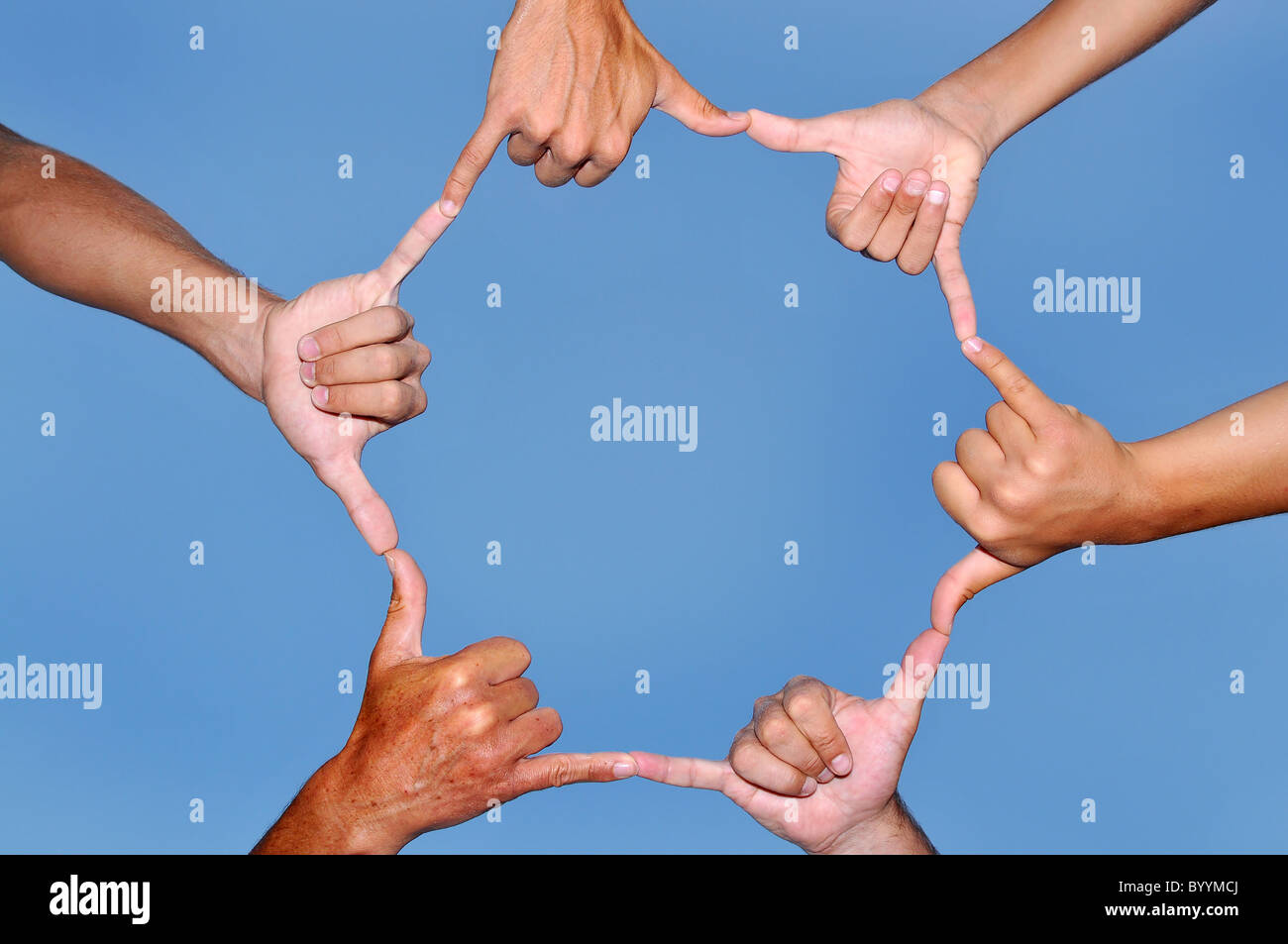 Human hands making a star against a deep blue sky Stock Photo - Alamy
