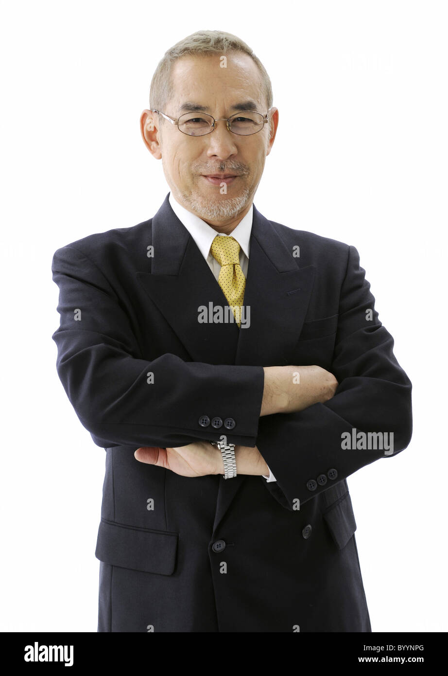 Businessman folding arms hi-res stock photography and images - Alamy