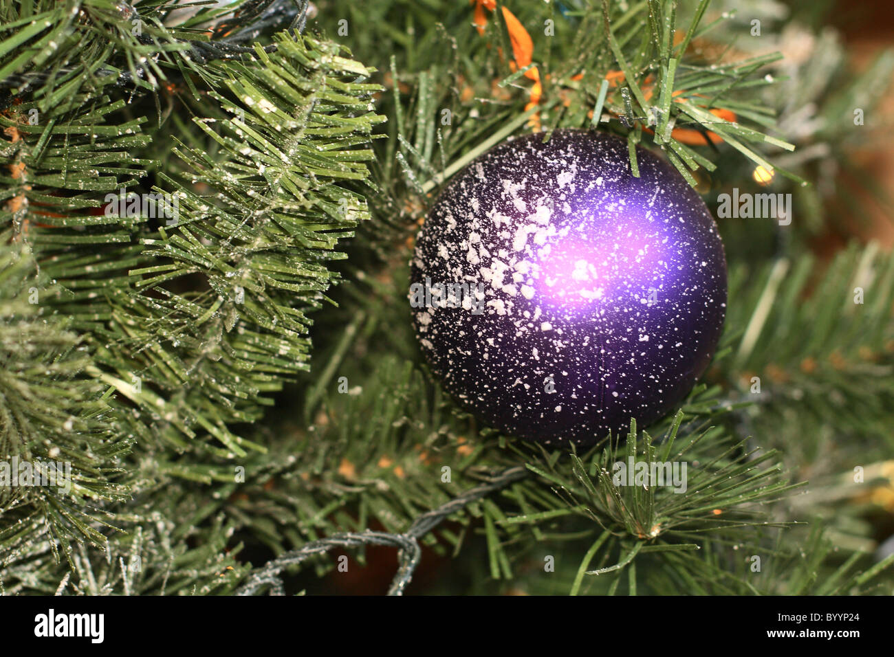 Bright festive balls on a Christmas tree Stock Photo - Alamy