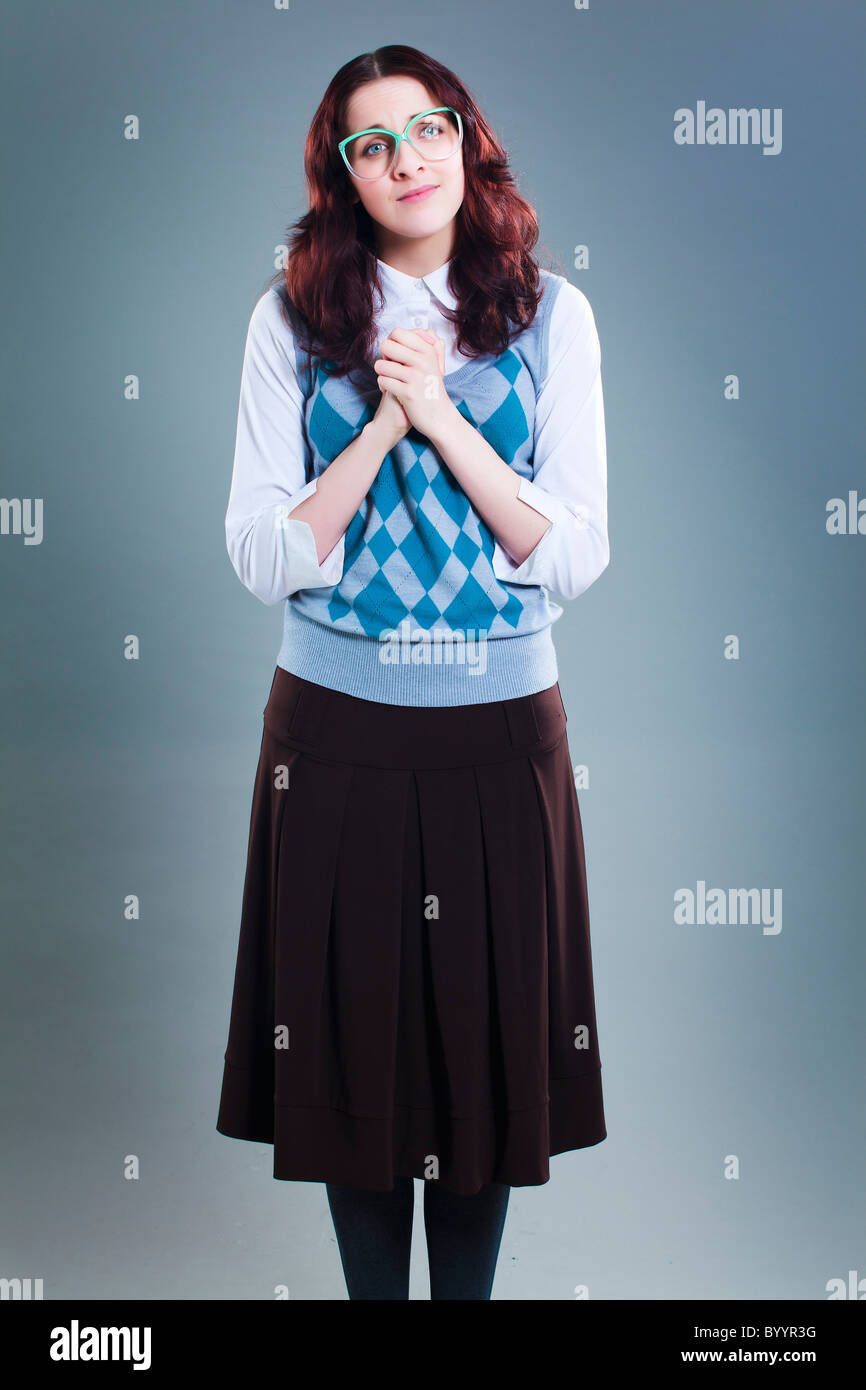 Hopeful geeky girl Stock Photo - Alamy