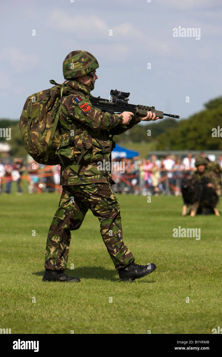 RAF police dogs demonstration of crowd control Stock Photo - Alamy