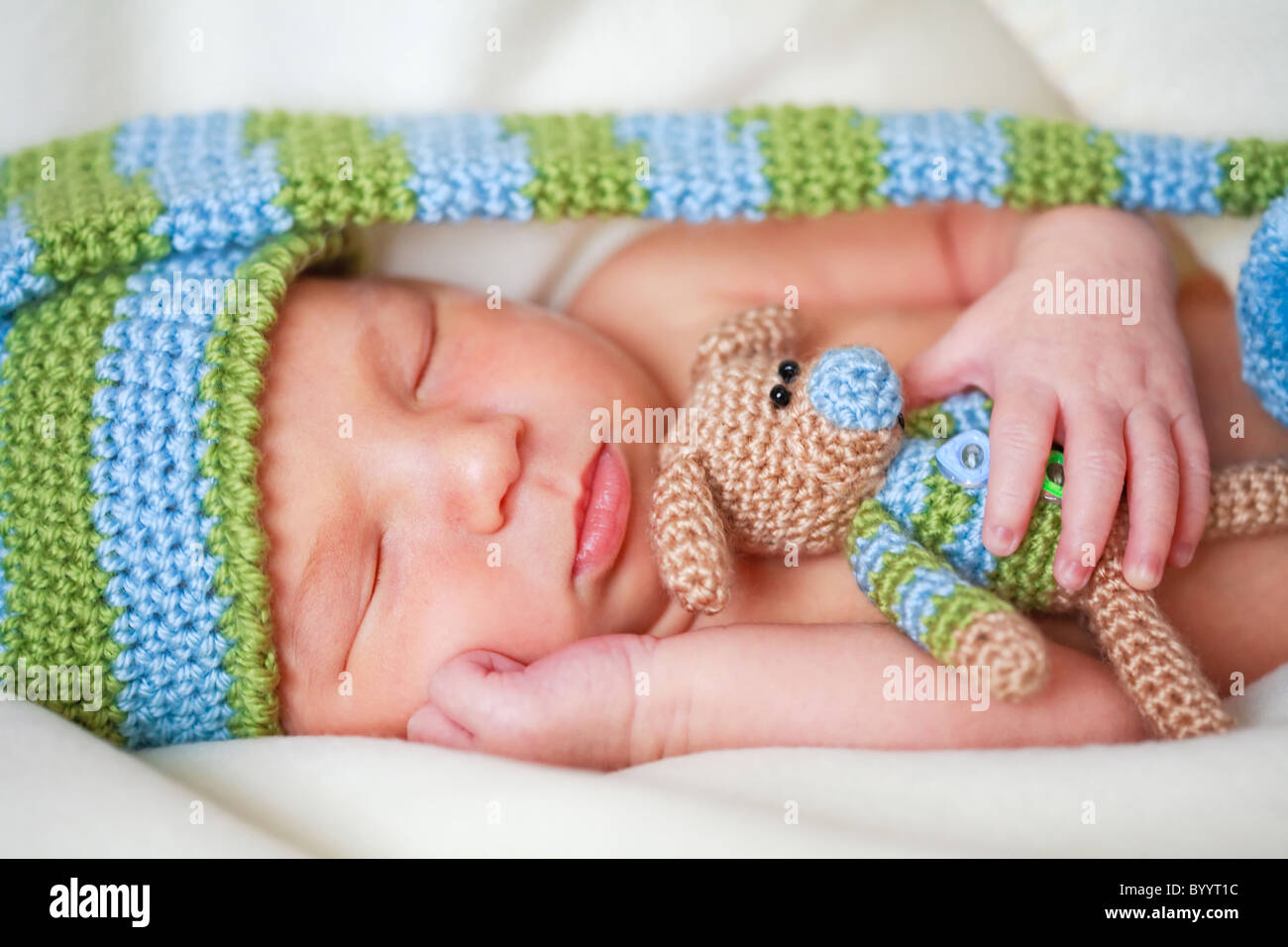 Baby with teddy hi-res stock photography and images - Alamy
