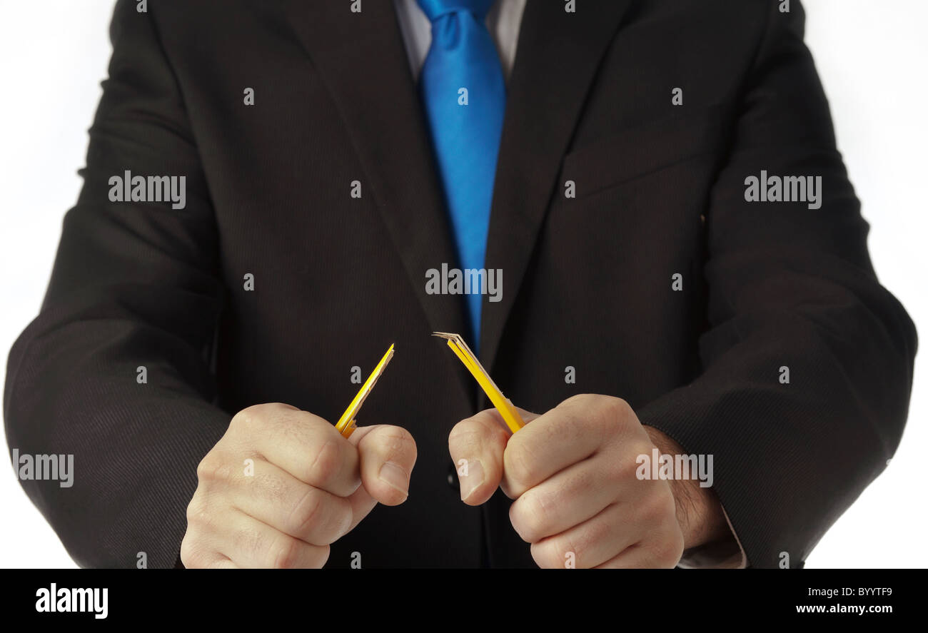 close up detail of mans hands breaking a pencil Stock Photo - Alamy