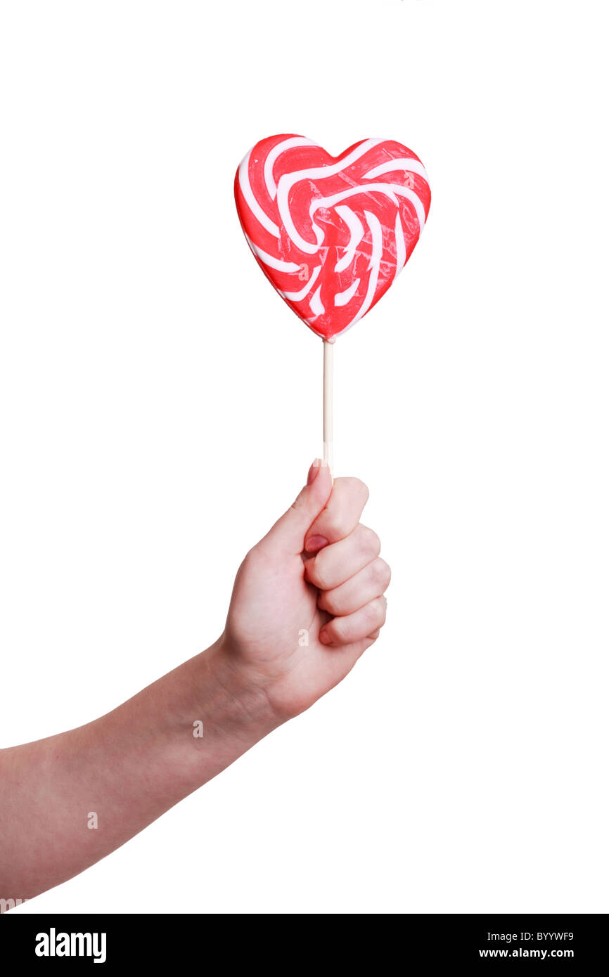 Lollipop in hand hi-res stock photography and images - Alamy