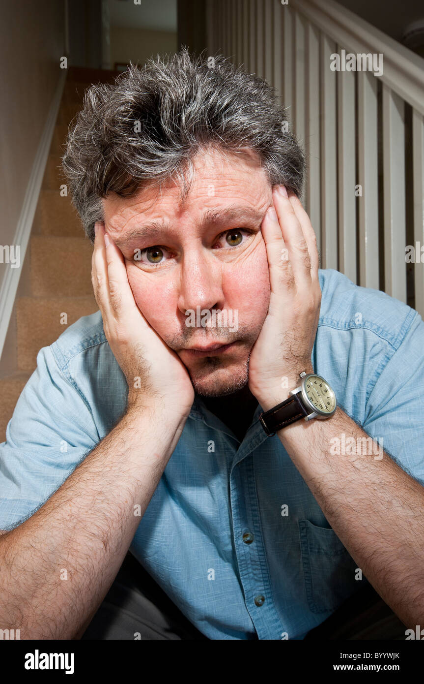 middle aged man feeling depressed sad lonely thinking poorly tired ...