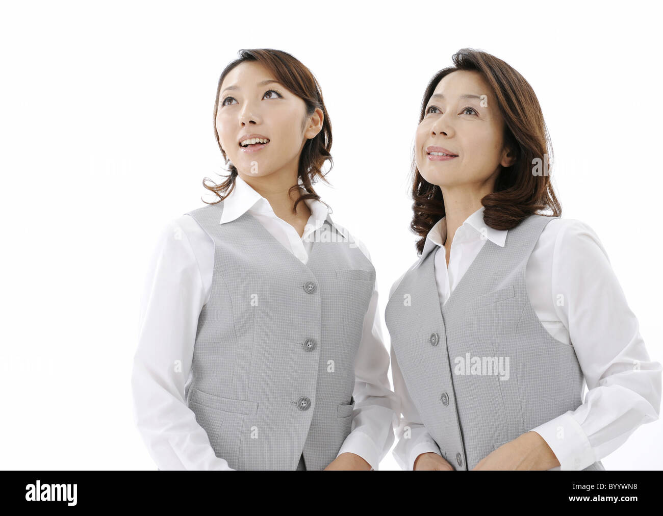 Office workers looking up Stock Photo - Alamy