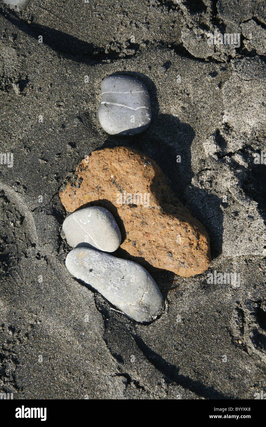 pile of rocks on beach shore Stock Photo - Alamy
