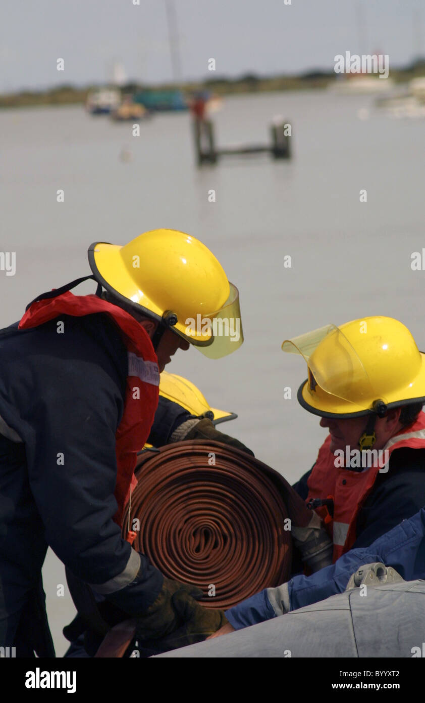 Essex firemen take to the water Stock Photo - Alamy