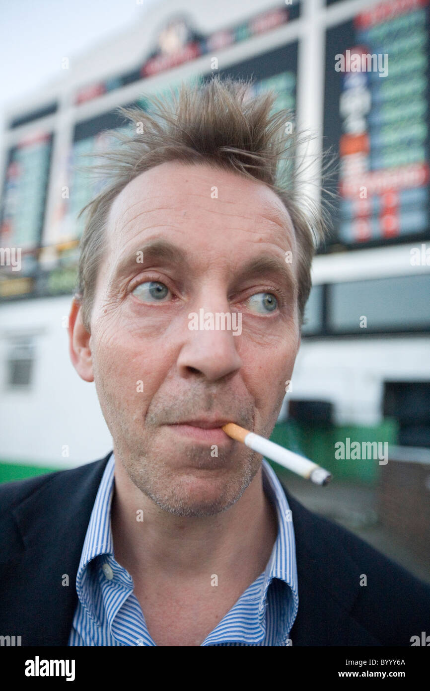 Man smoking cigarette Stock Photo - Alamy