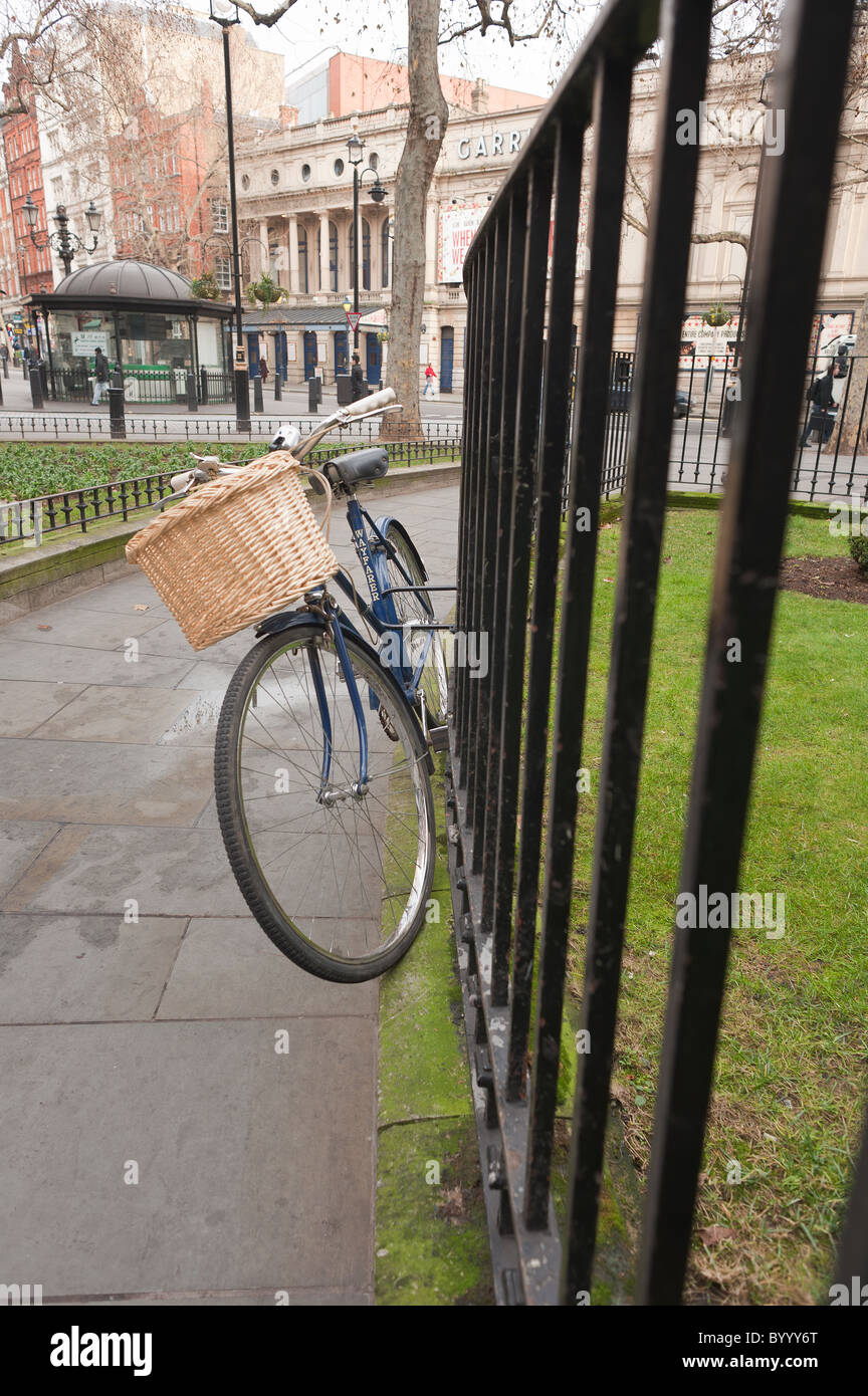 Bike chained to railings National Portrait Gallery Stock Photo - Alamy