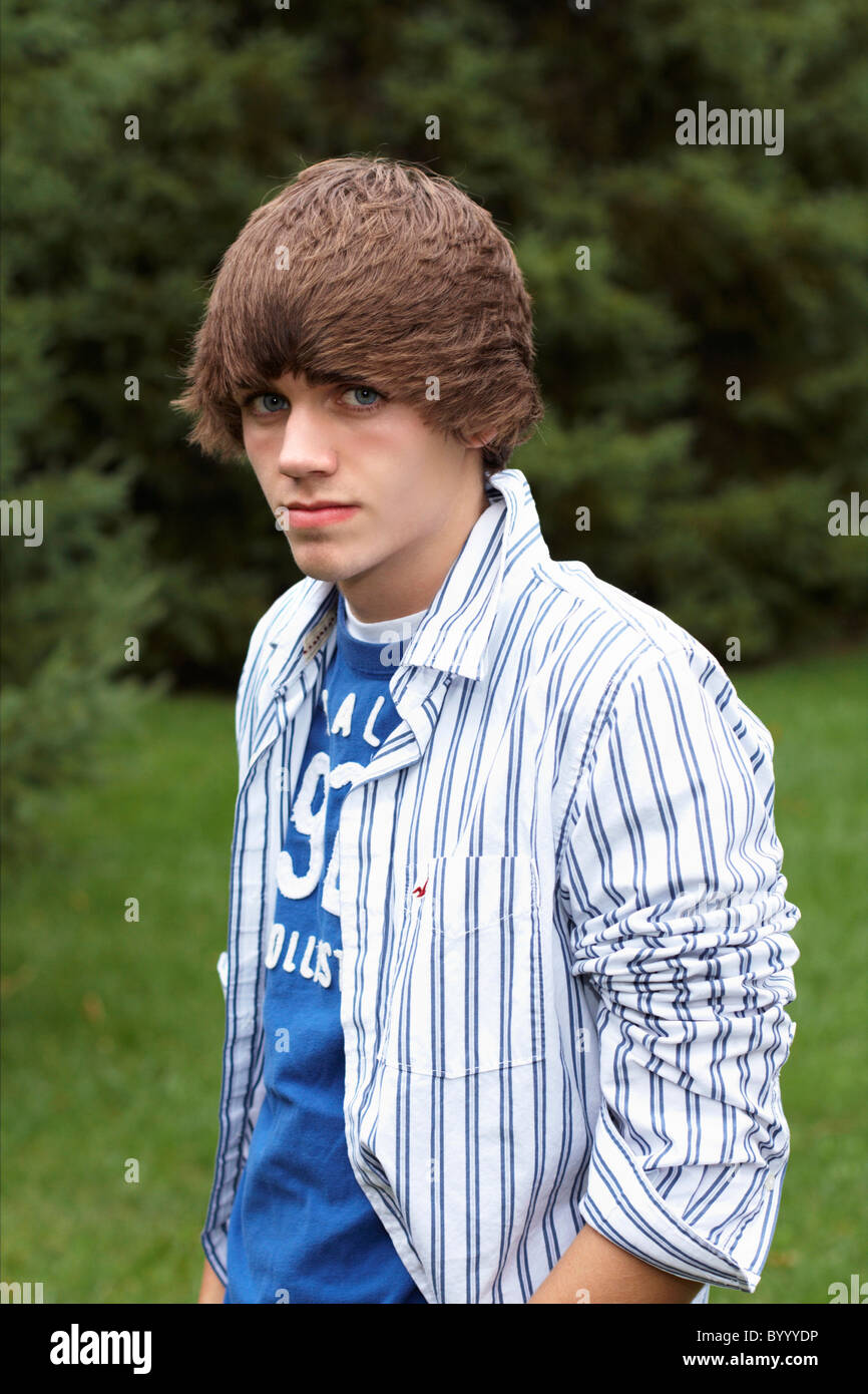 A teenage boy with shaggy hair Stock Photo - Alamy