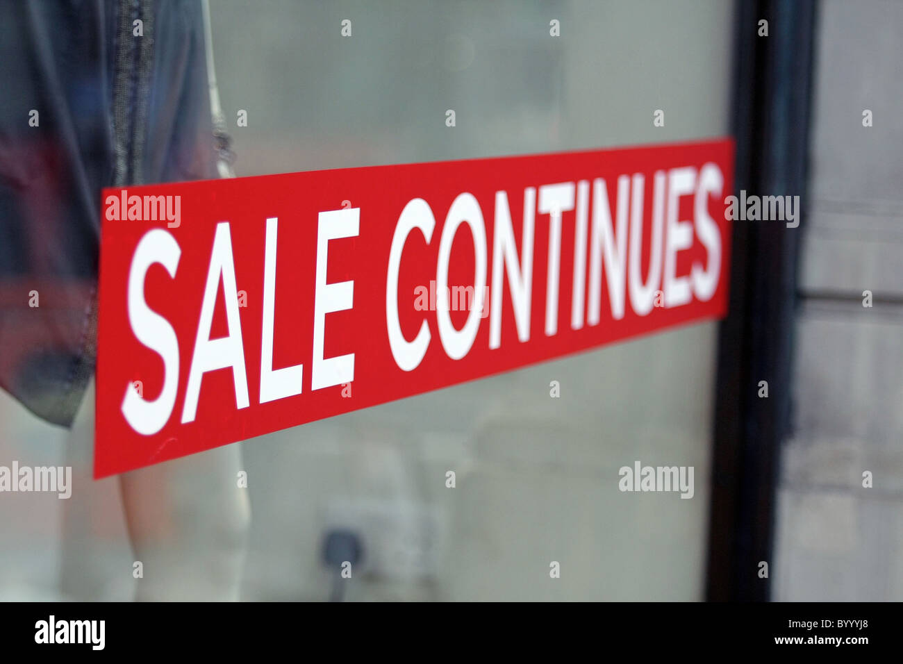 Sale continues sign window hi-res stock photography and images - Alamy