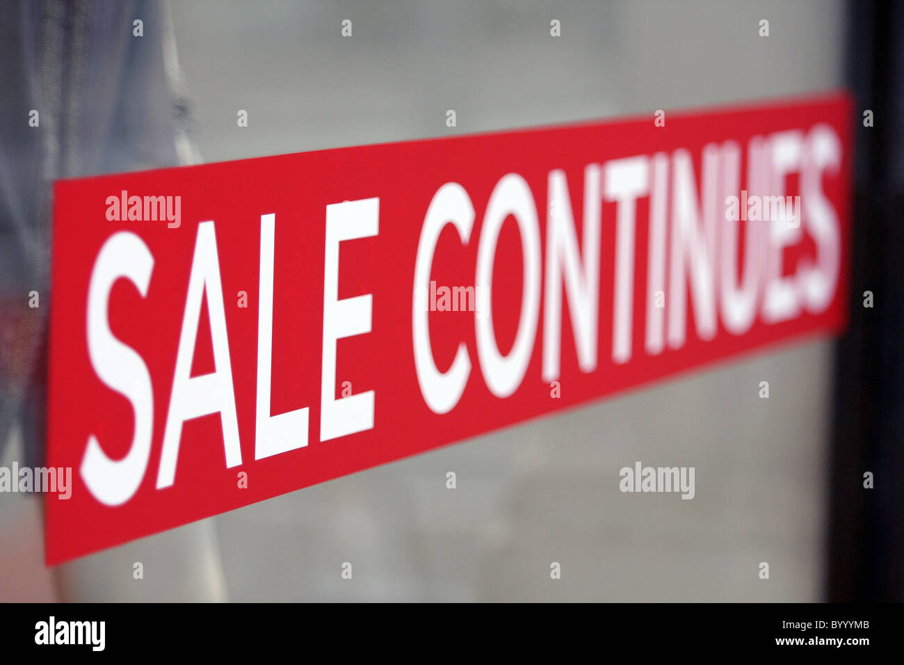 sale sign in a shop window Stock Photo - Alamy
