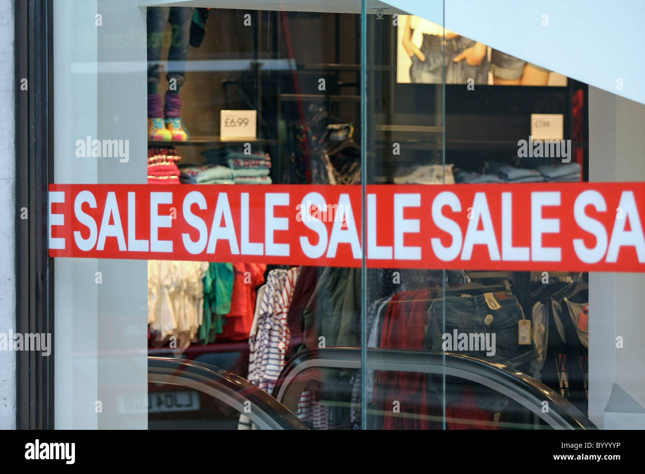 sale sign in a shop window Stock Photo - Alamy